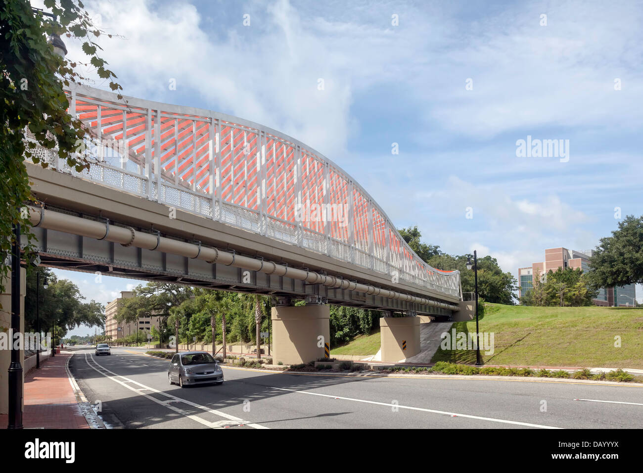 Orange pedestrian bridge across SW 13th Street at intersection with ...