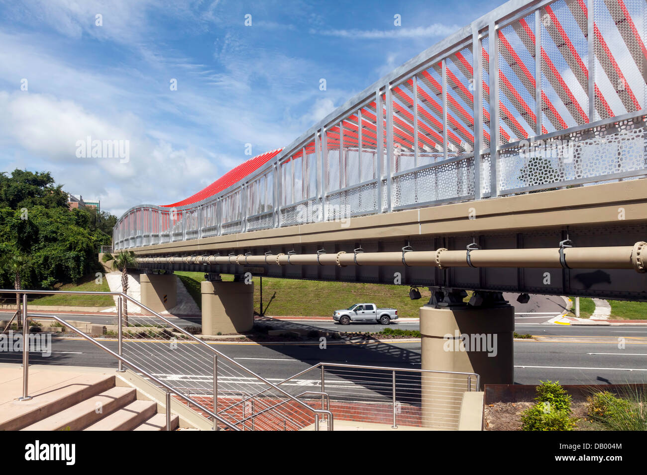 Orange pedestrian bridge across SW 13th Street at intersection with ...