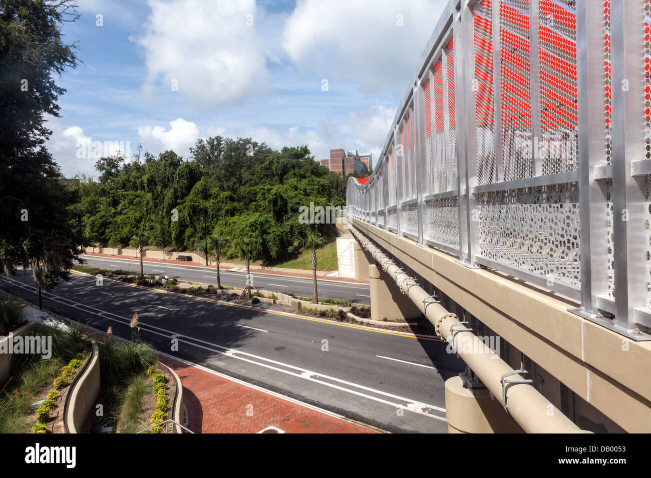Orange pedestrian bridge across SW 13th Street at intersection with ...
