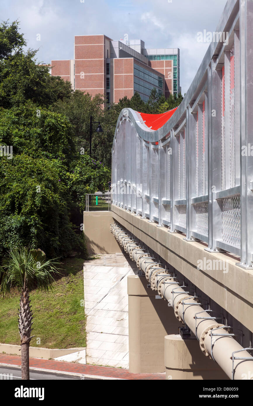 Orange pedestrian bridge across SW 13th Street at intersection with ...