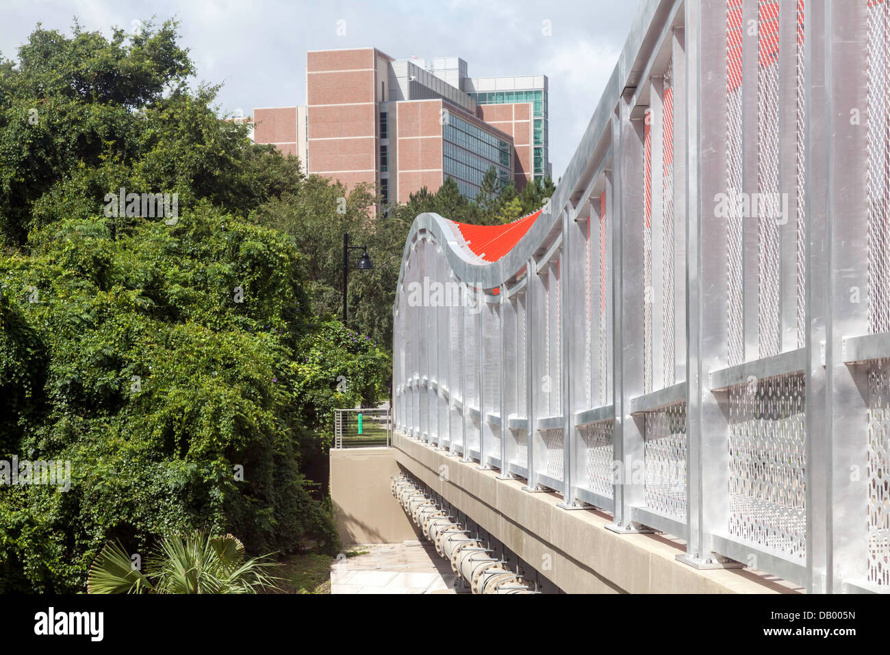 Orange pedestrian bridge across SW 13th Street at intersection with ...