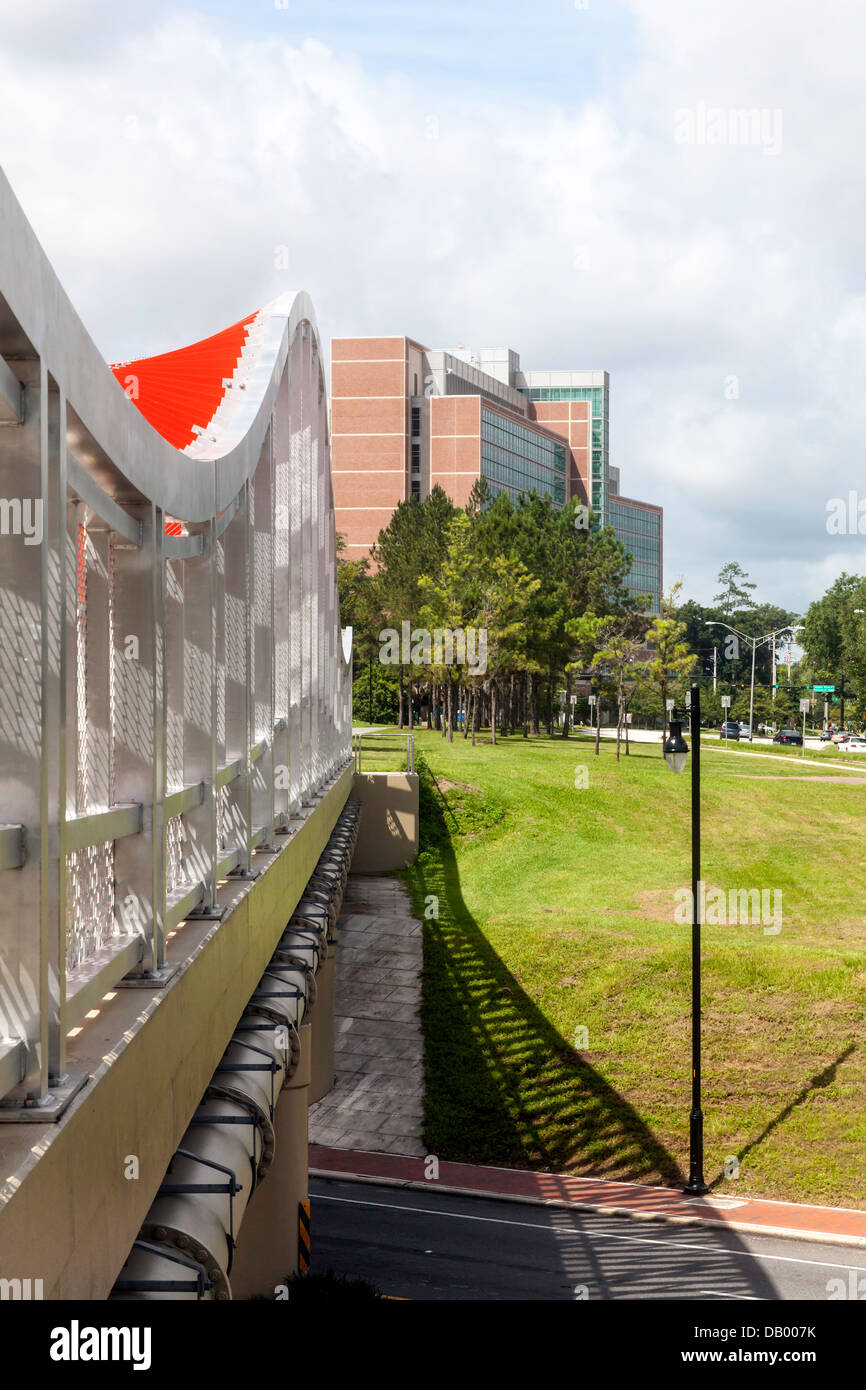 Orange pedestrian bridge across SW 13th Street at intersection with ...