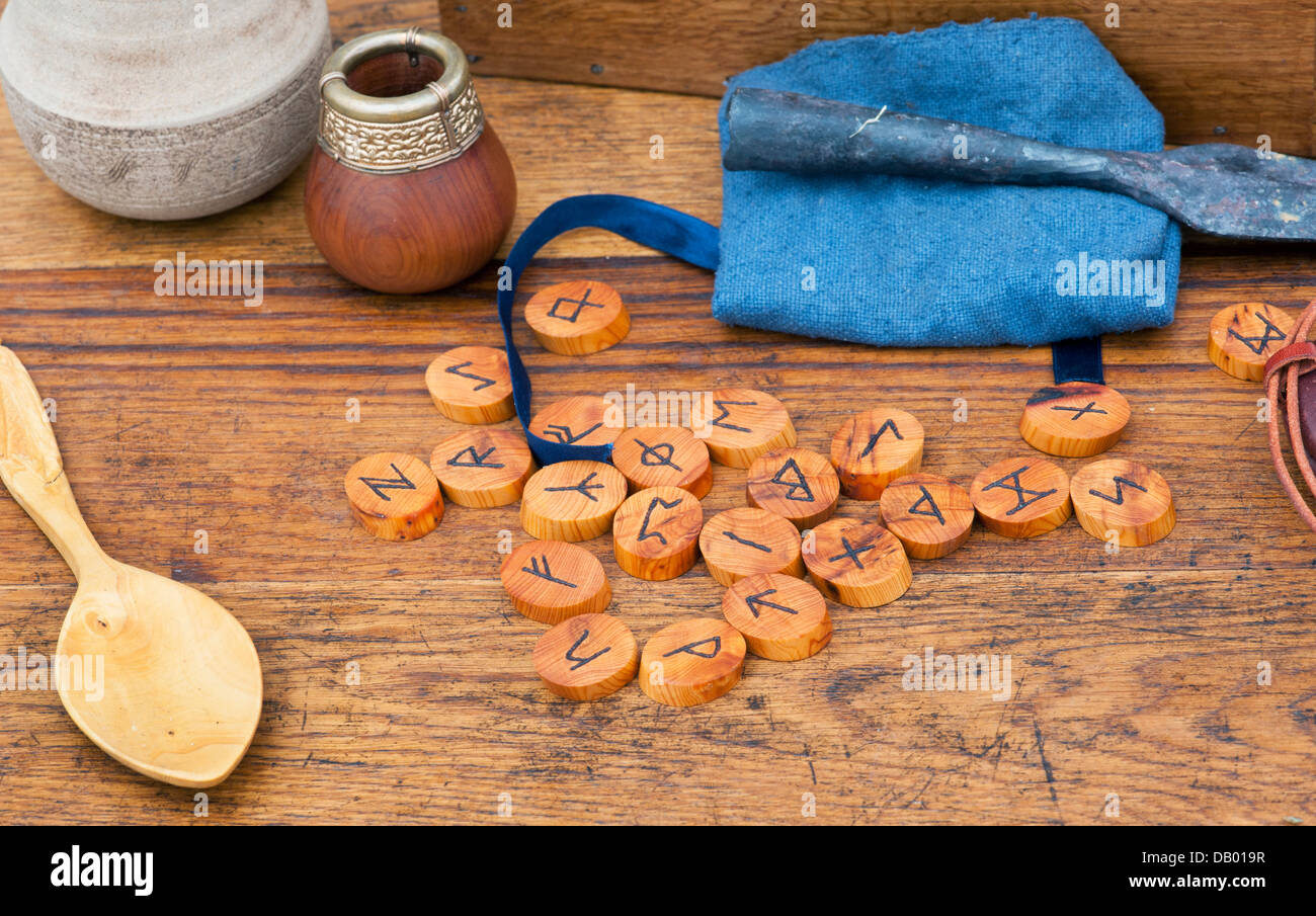 Anglo Saxon wooden runes on a table at a historical re enactment Stock ...