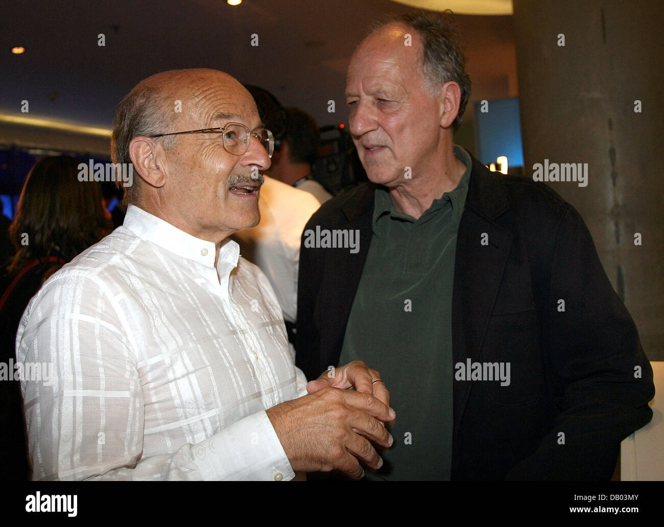 German directors Volker Schloendorff (L) and Werner Herzog talk to each ...