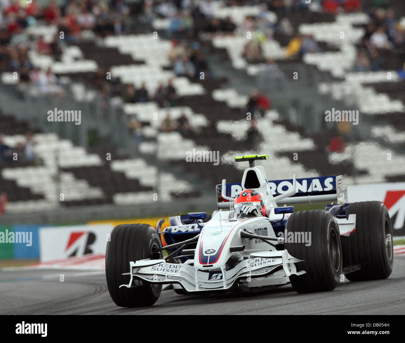 Polish Formula One pilot Robert Kubica of BMW Sauber paces the track ...