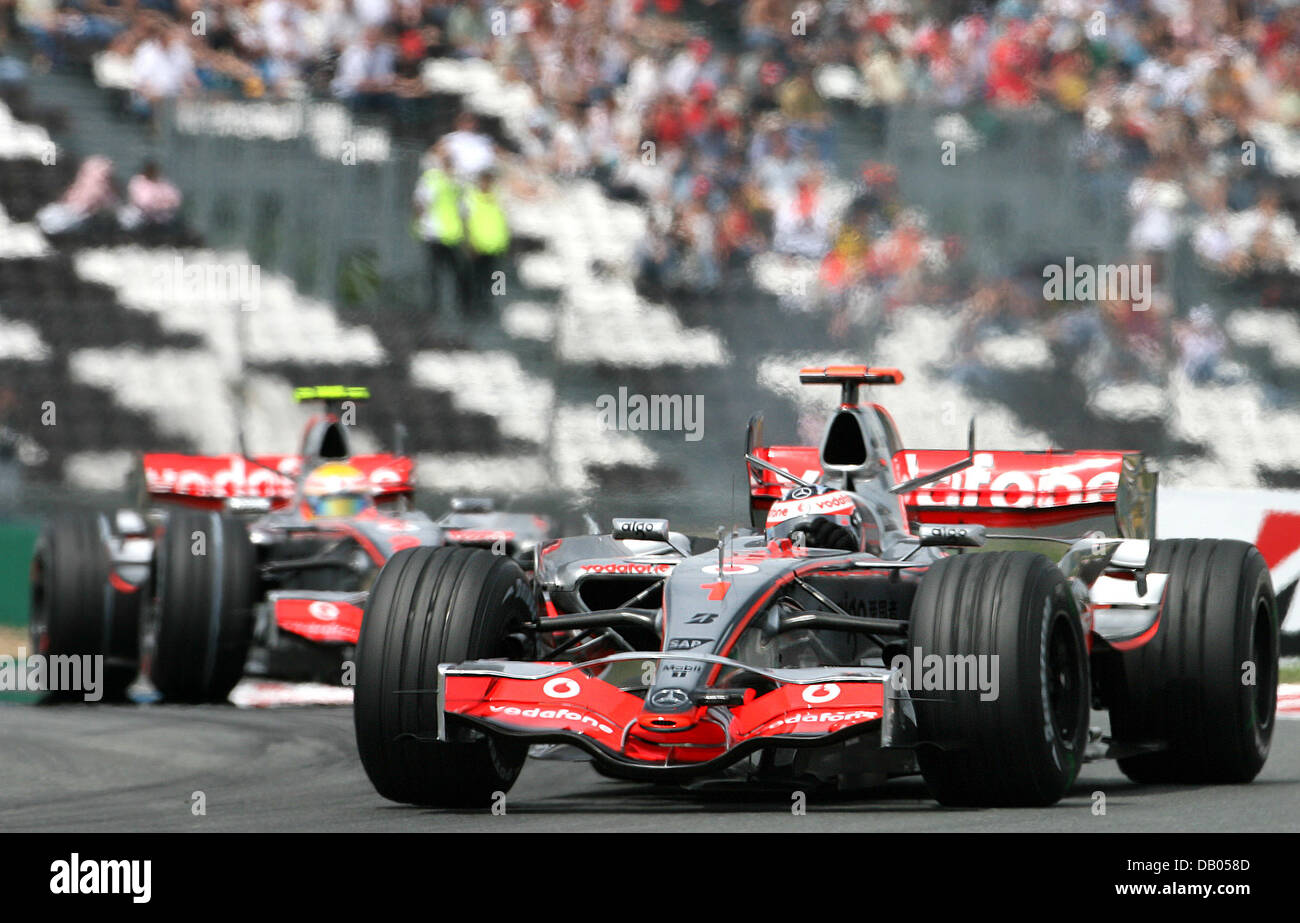 British Formula One pilot Lewis Hamilton of McLaren Mercedes (L ...