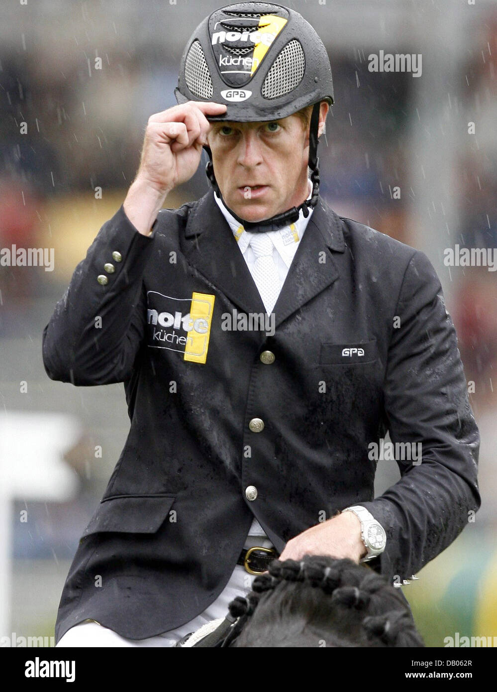 German equestarian Marcus Ehning and his horse 'Sandro Boy' are ...