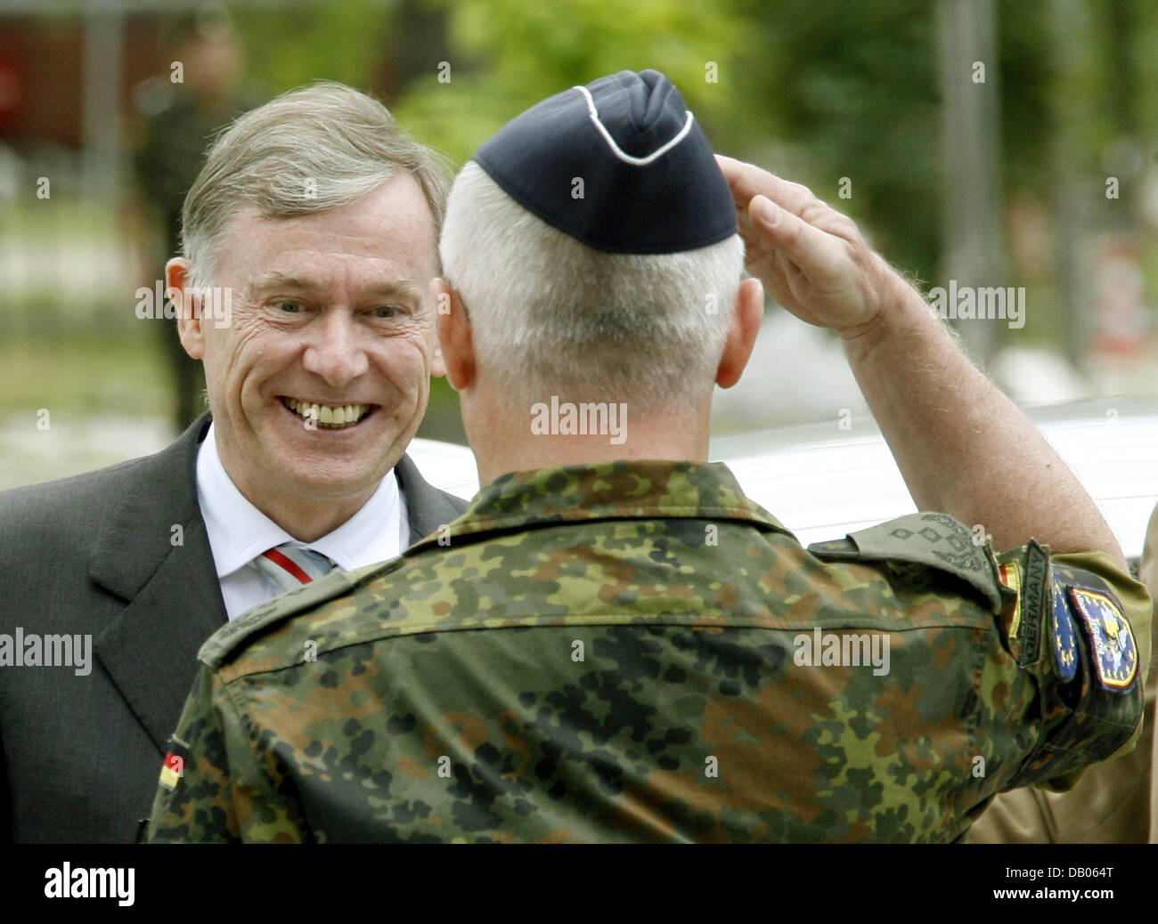 Brigardier Rudolf Giegeling (front) salutes to welcome German President ...