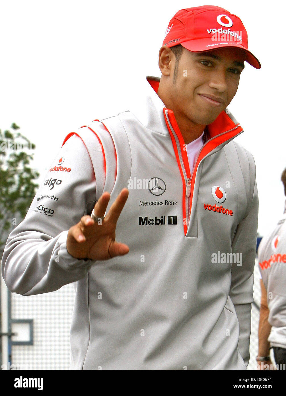 Lewis hamilton arrives in the paddock hi-res stock photography and ...
