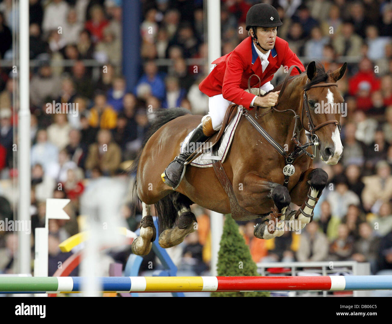 US equestrian Richard Spooner and his horse 'Cristallo' take an ...