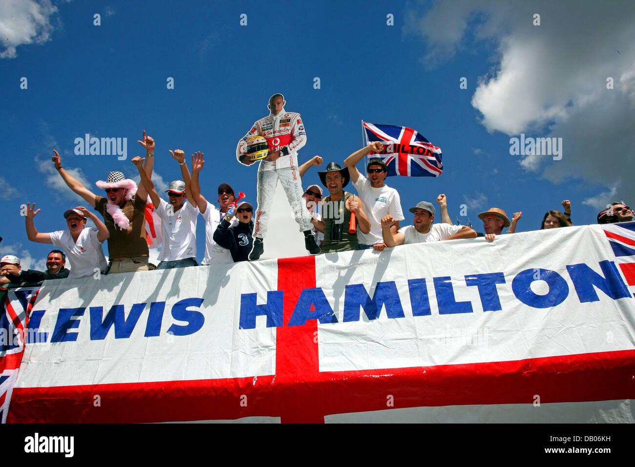 Cheering fans of the British Formula One driver Lewis Hamilton of ...