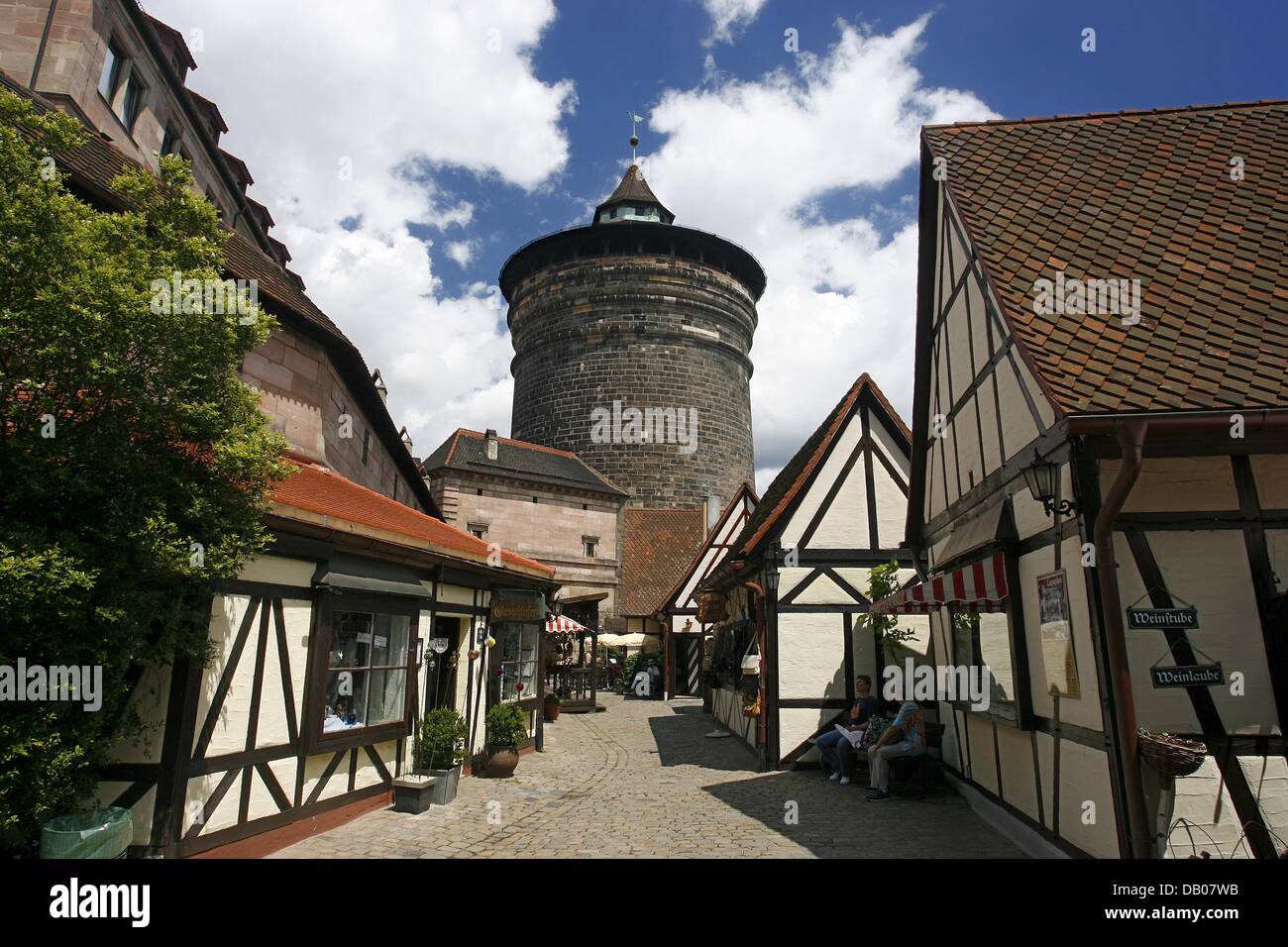 The picture shows a view towards the tower of the King's Gate ...