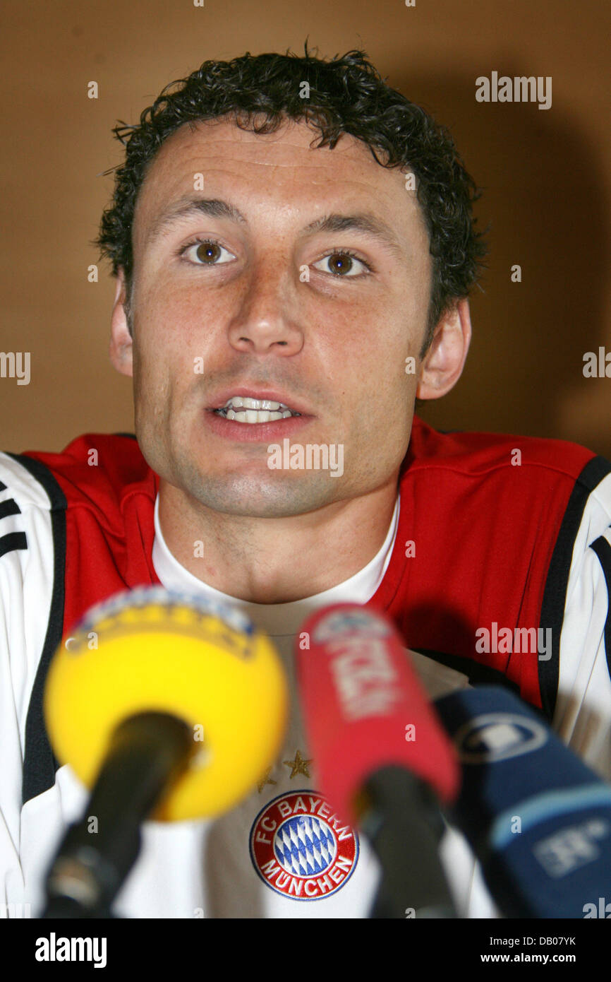 Bayern Munich player Mark van Bommel talks at a press conference in ...