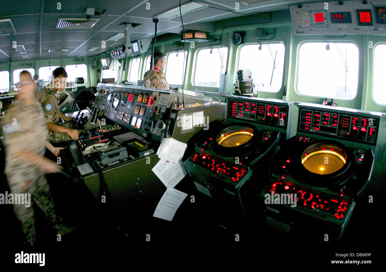The bridge of German Navy frigate 'Schleswig-Holstein' is busy offshore ...