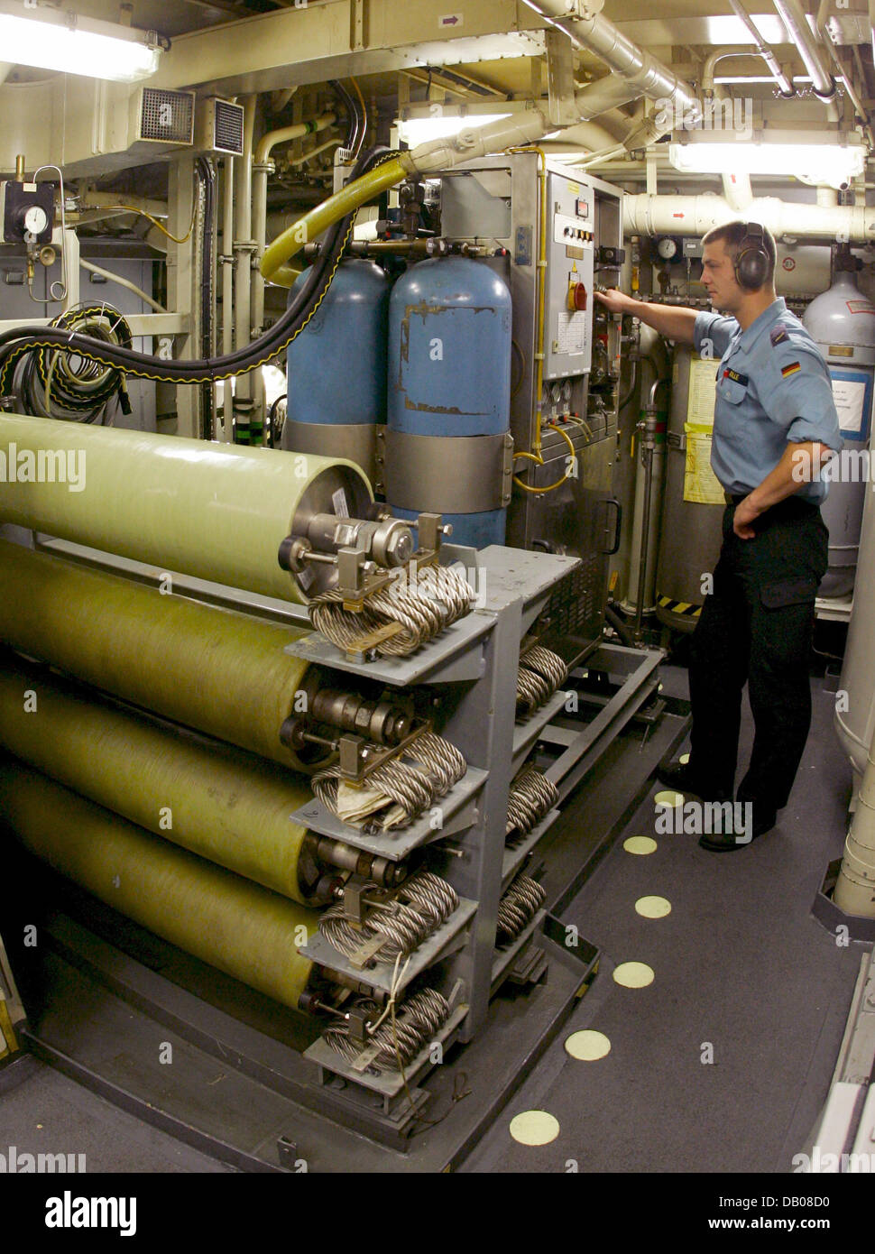 A German Navy soldier works on the freshwater reprocessing plant of ...