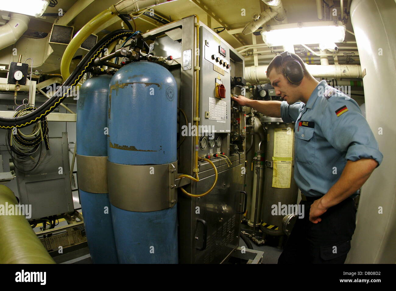 A German Navy soldier works on the freshwater reprocessing plant of ...
