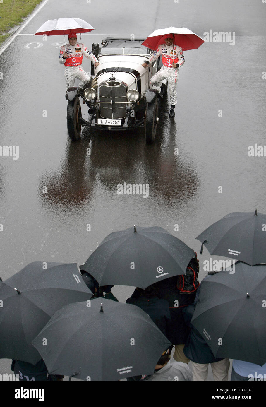 British Formula One driver Lewis Hamilton (R) and Spanish team mate ...