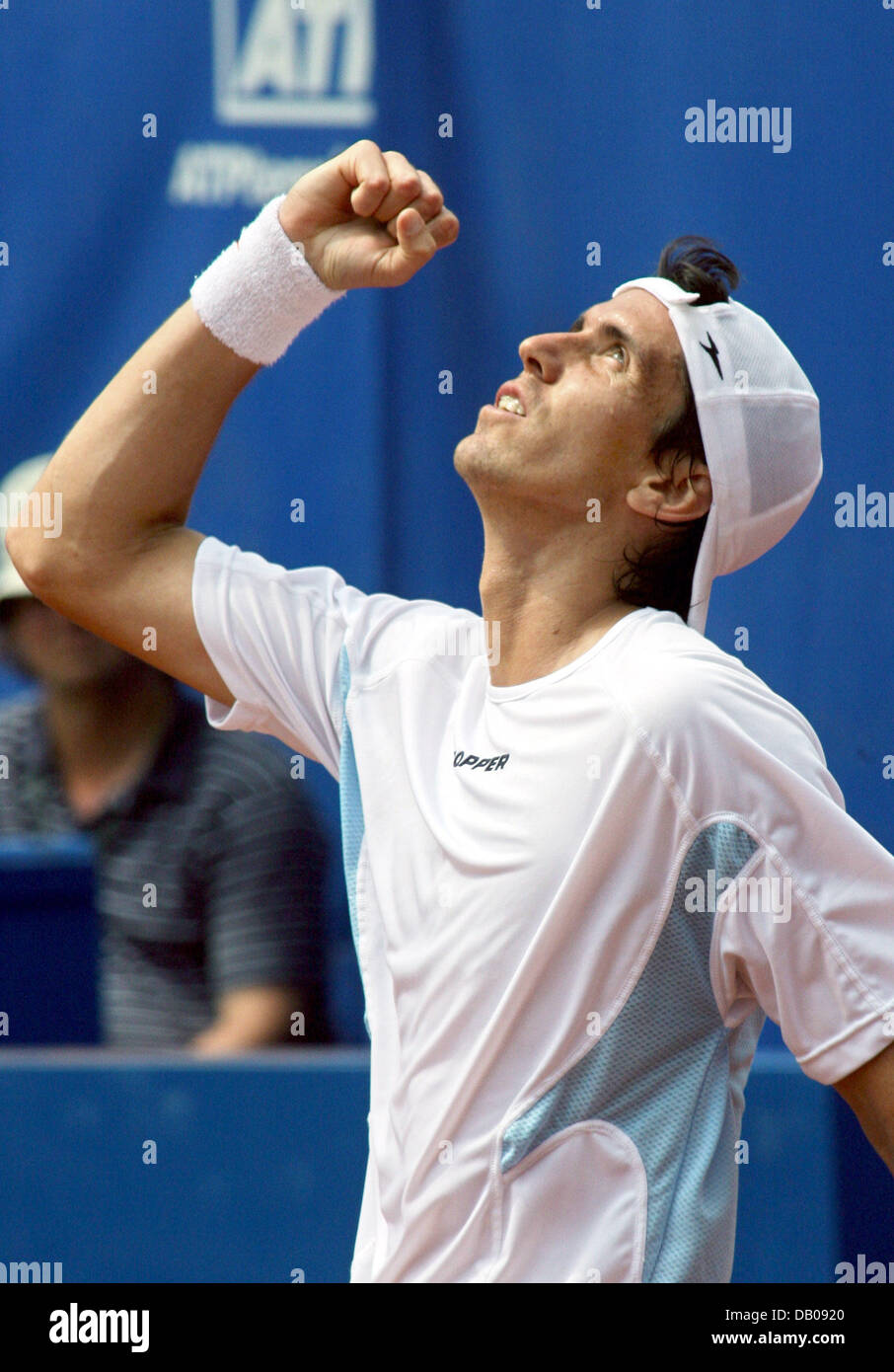 Argentine tennis pro Juan Ignacio Chela cheers winning his quarter ...