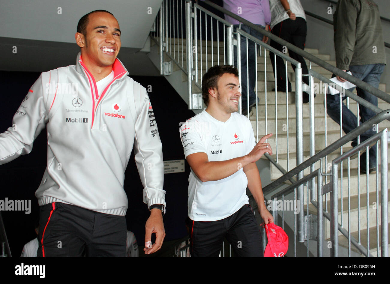 Spanish Formula One driver Fernando Alonso (R) and his British rookie ... Spanish Formula One driver Fernando Alonso (R) and his British rookie ...