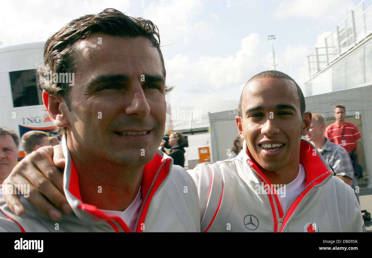 British Formula One rookie Lewis Hamilton (R) of McLaren Mercedes and ...