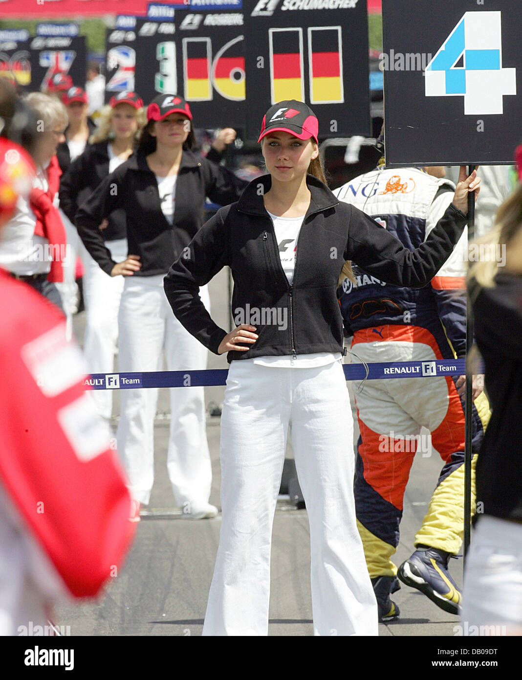Grid girls stand in the starting grid before the Formula One Grand Prix ...
