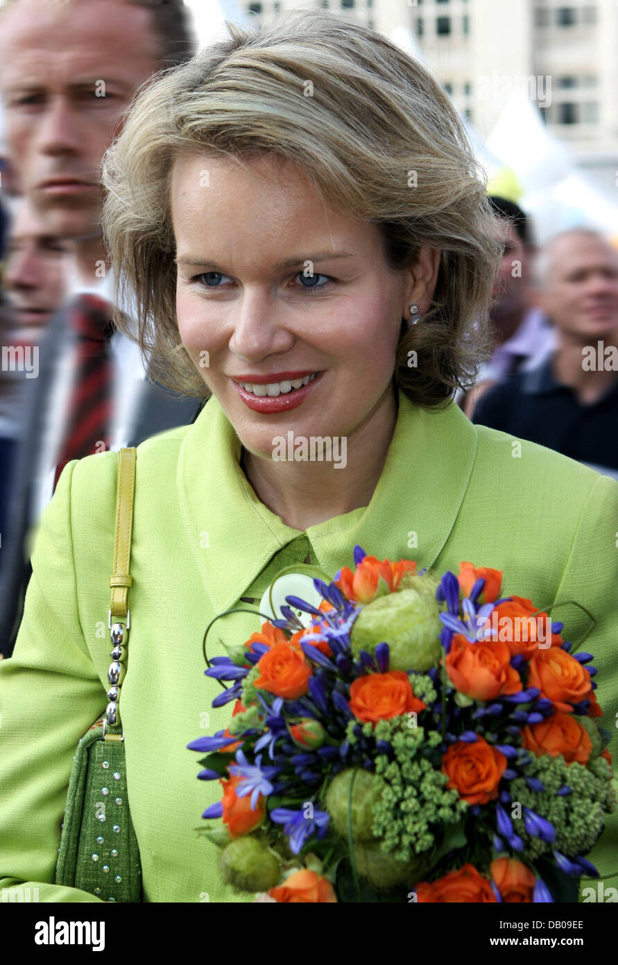 Crown Princess Mathilde of Belgium smiles in front of the royal palace ...