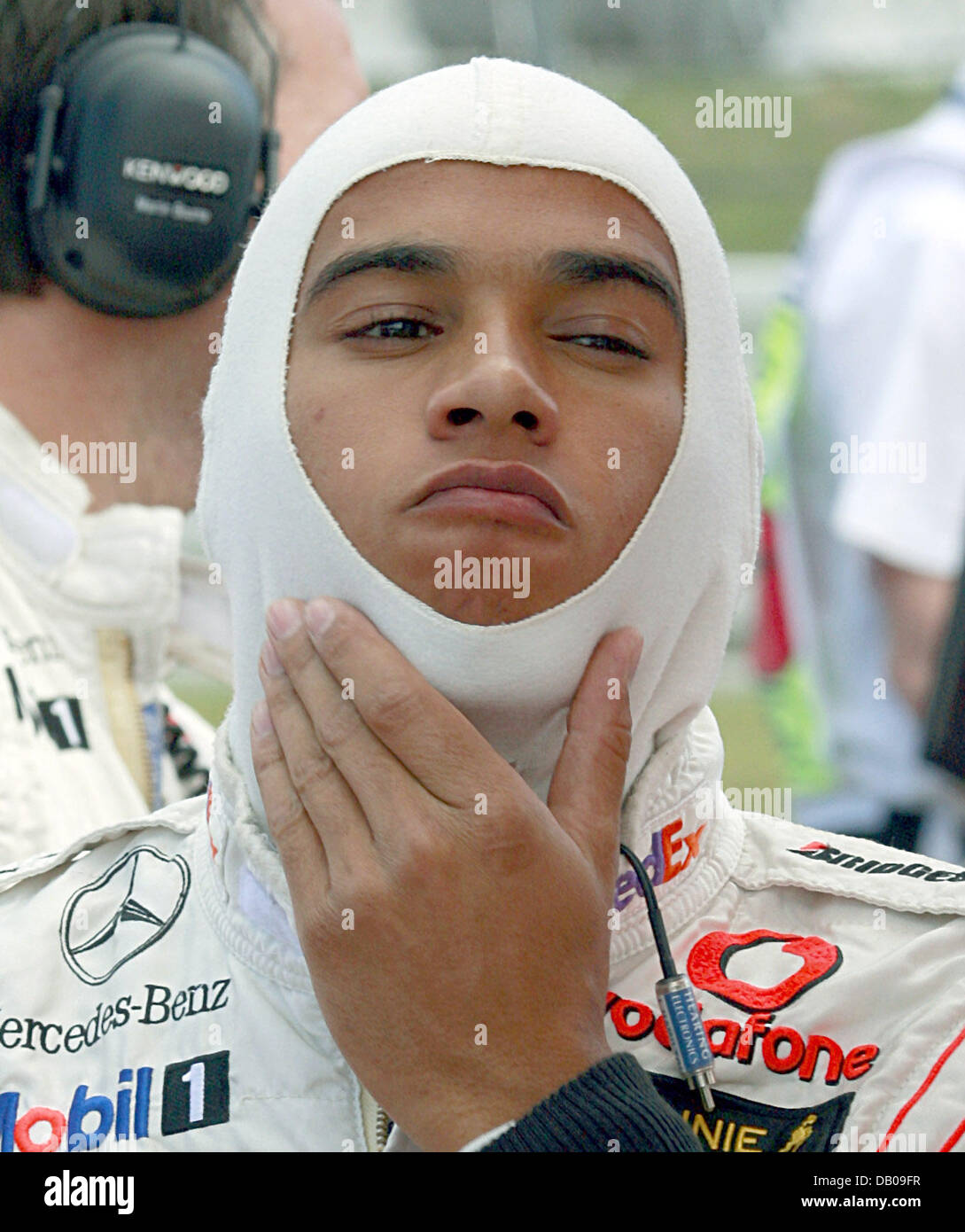 British Formula One pilot Lewis Hamilton of McLaren Mercedes gestures ...