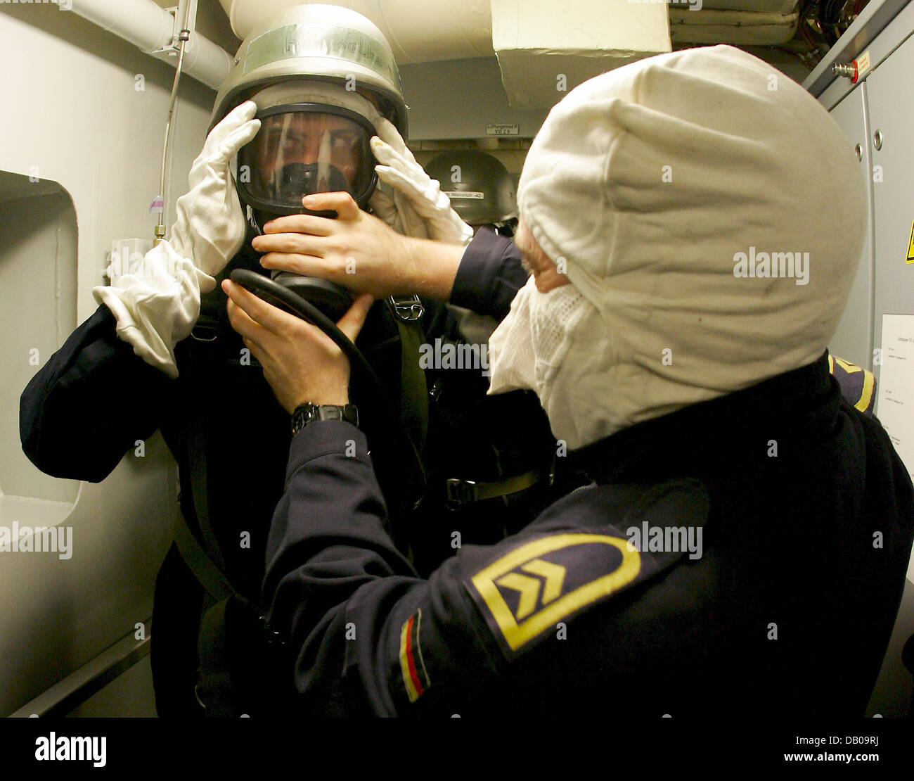German Navy soldiers train a fire fighting on frigate 'Schleswig ...