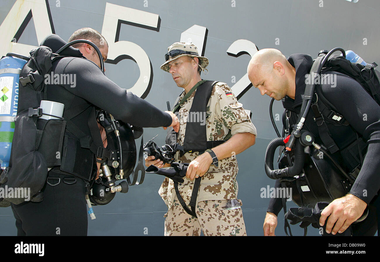 German Navy frogmen prepare for their training in the harbour of ...