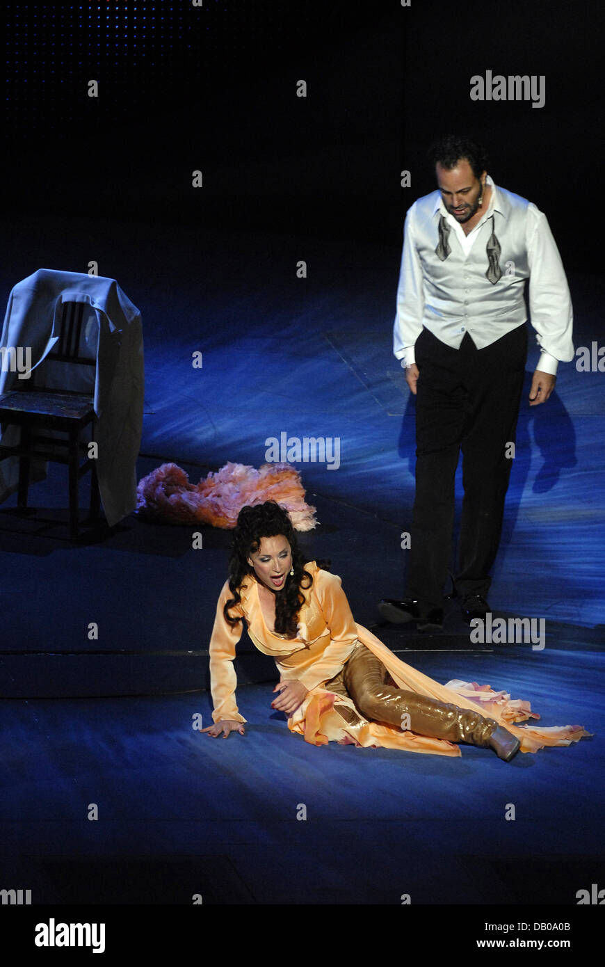Nadja Michael as Tosca (L) and Gidon Saks as Scarpia (R) rehearse a ...