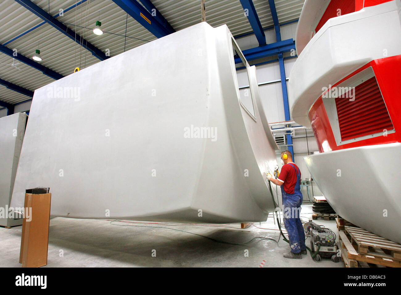 A technician works on an engine pod for wind energy plants at the new ...