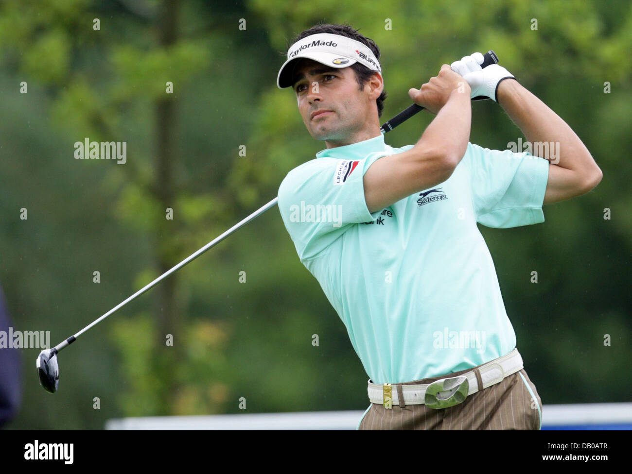 The English golf player Lee Slattery strikes the ball during the ...
