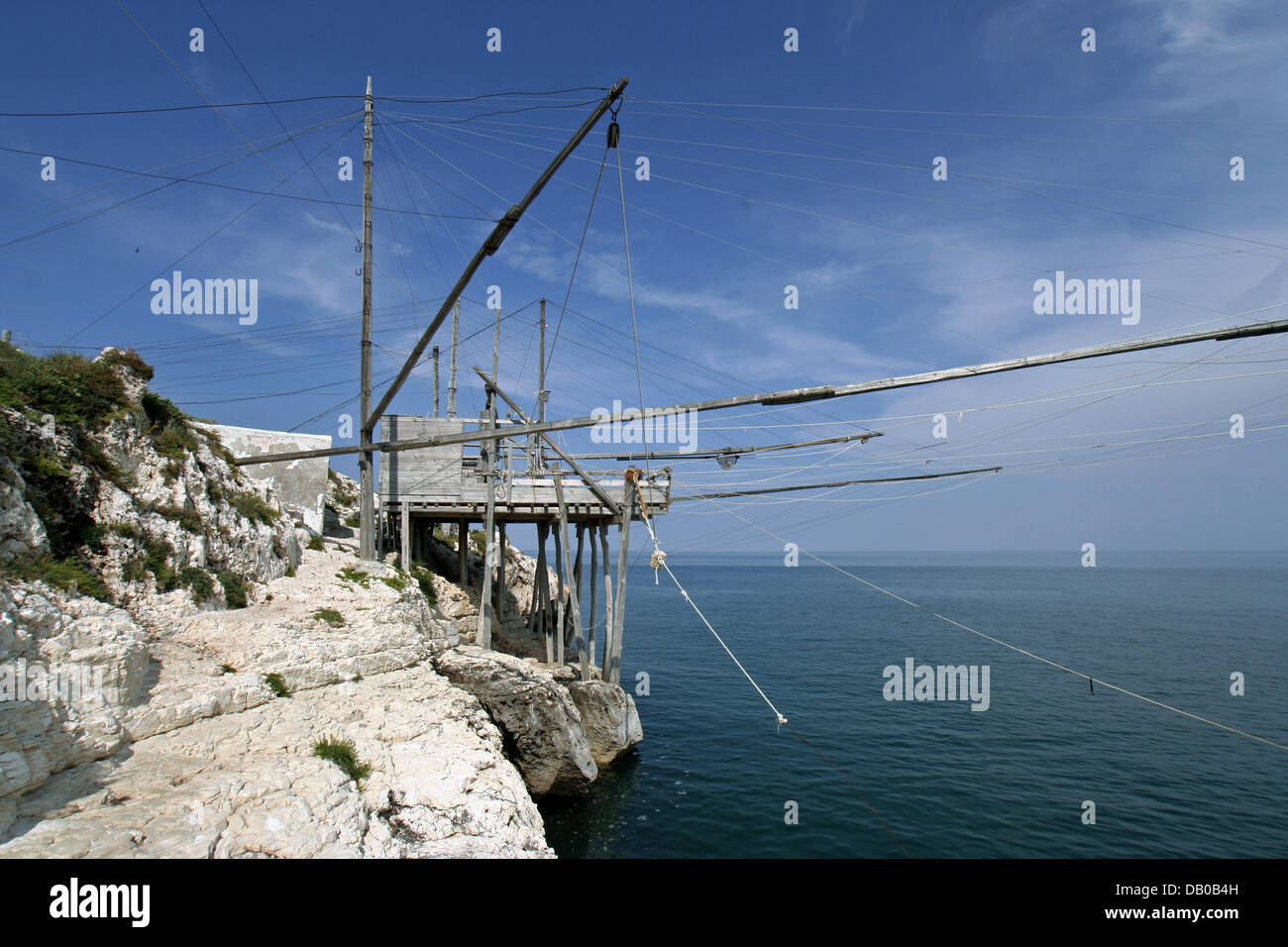 Cast fishing rods are pictured at the coast of Vieste, Italy, 11 June ...