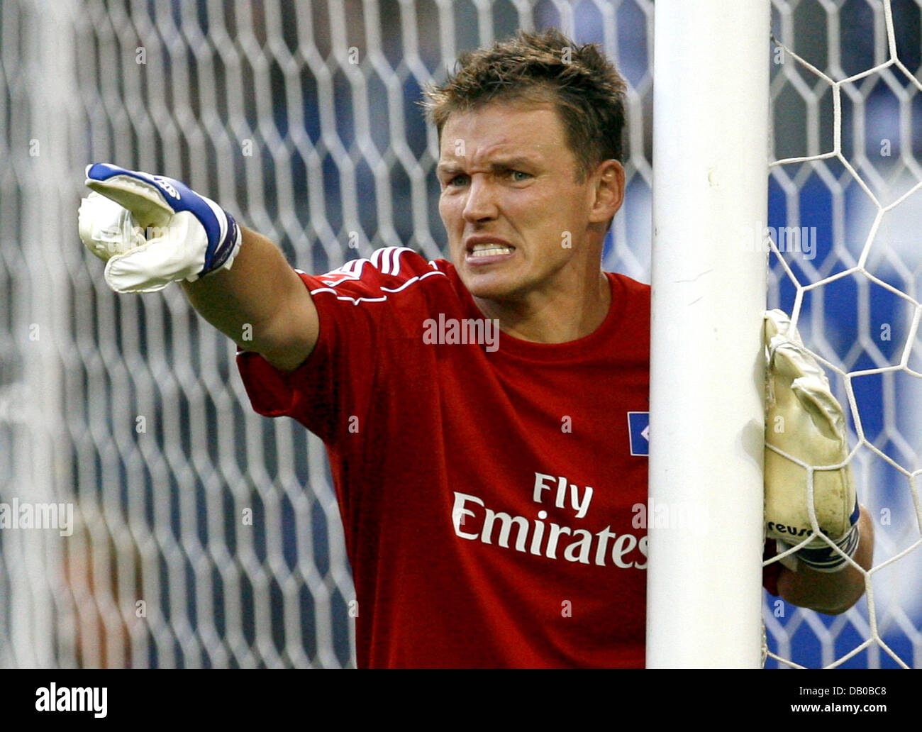 Frank Rost, goalkeeper of Hamburg SV, gestures during the match against ...
