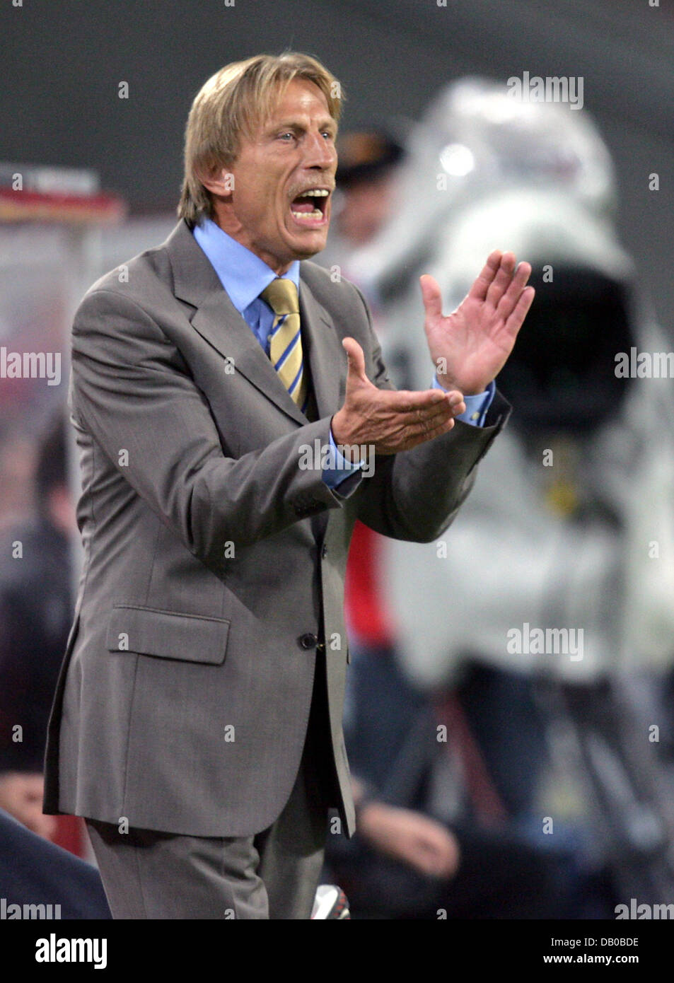 Cologne's head coach Christoph Daum gestures at the sideline during the ...