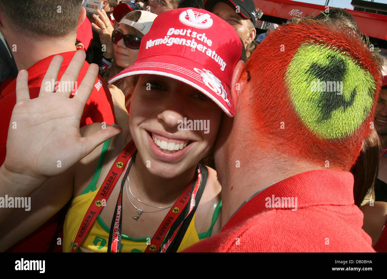 Ferrari supporters cheer at the Hungaroring race track near Budapest ...