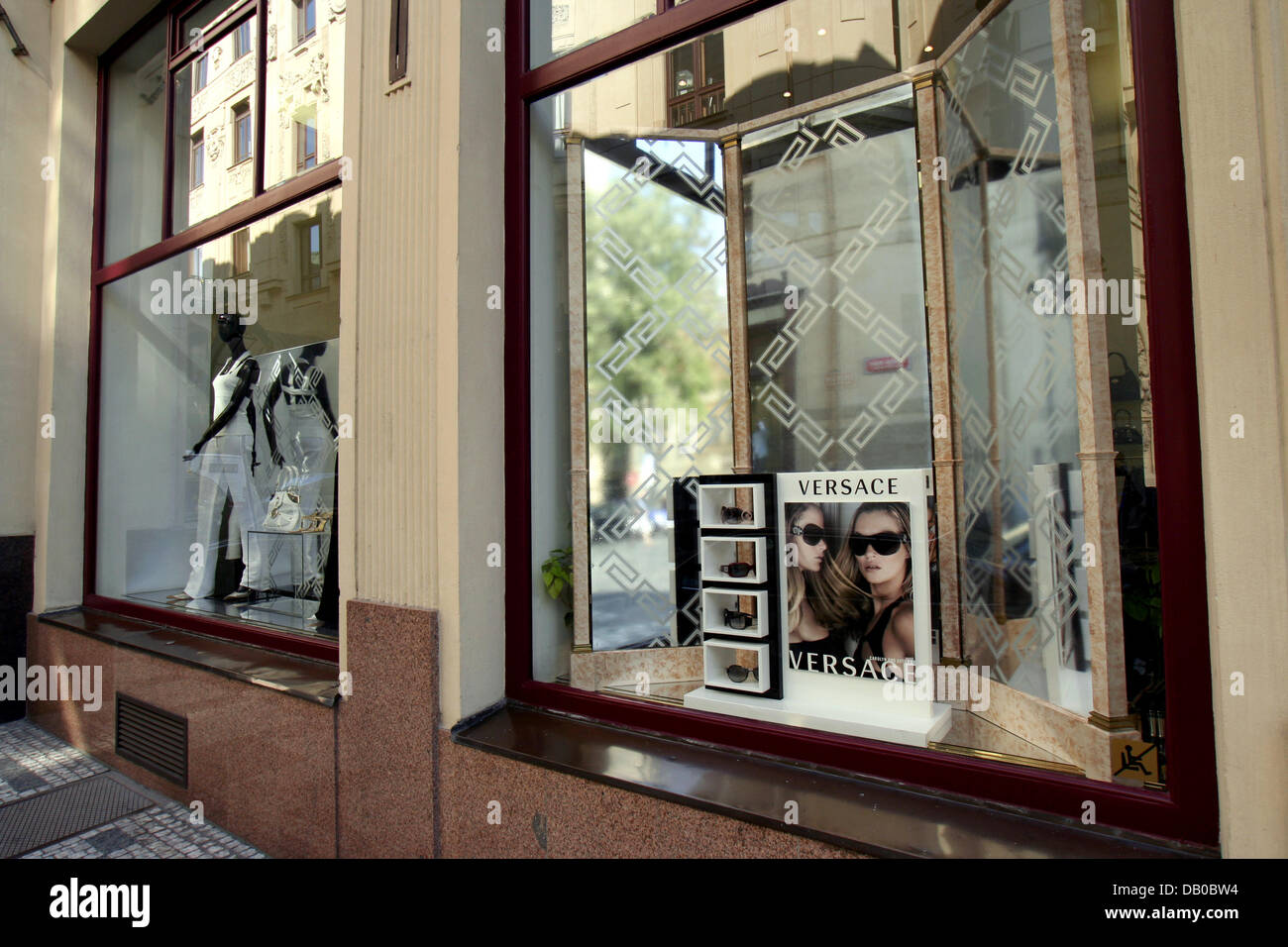 The picture shows a display window of designer 'Versace' in Prague ...