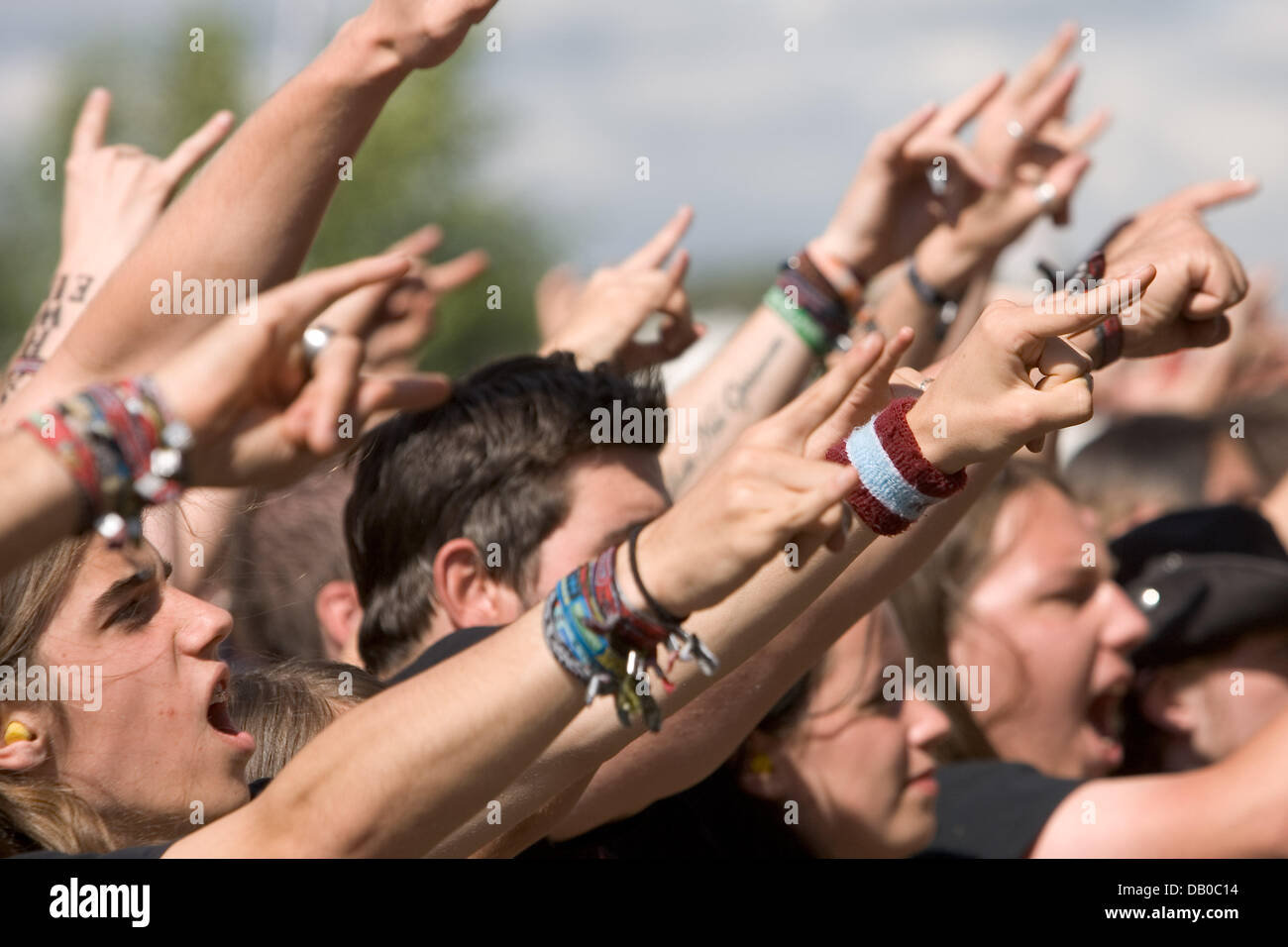 Heavy Metal fans cheer the band at 'Wacken Open Air' festival in Wacken ...
