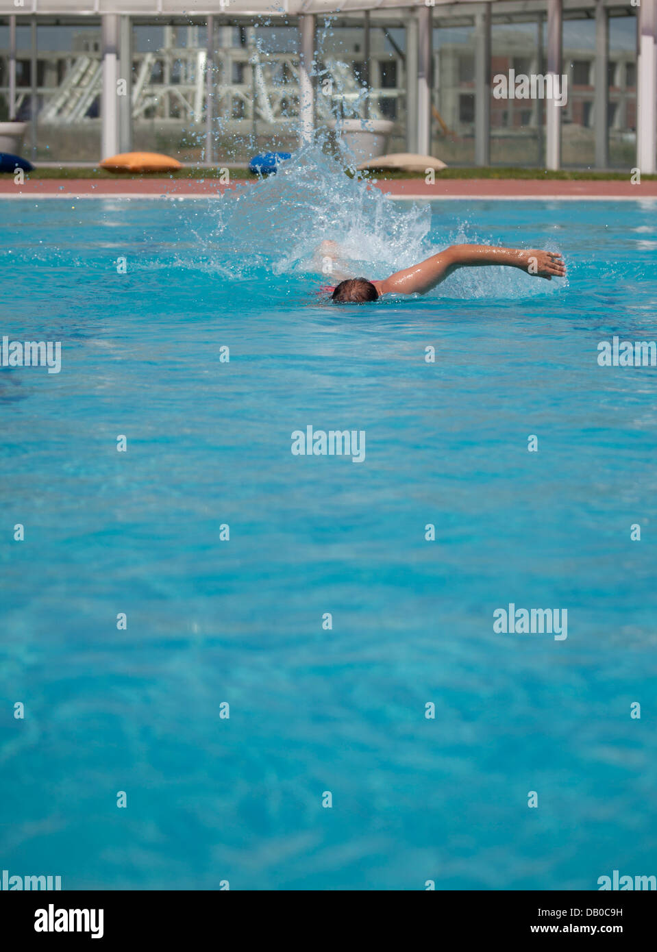 a young man blue water diving Stock Photo - Alamy