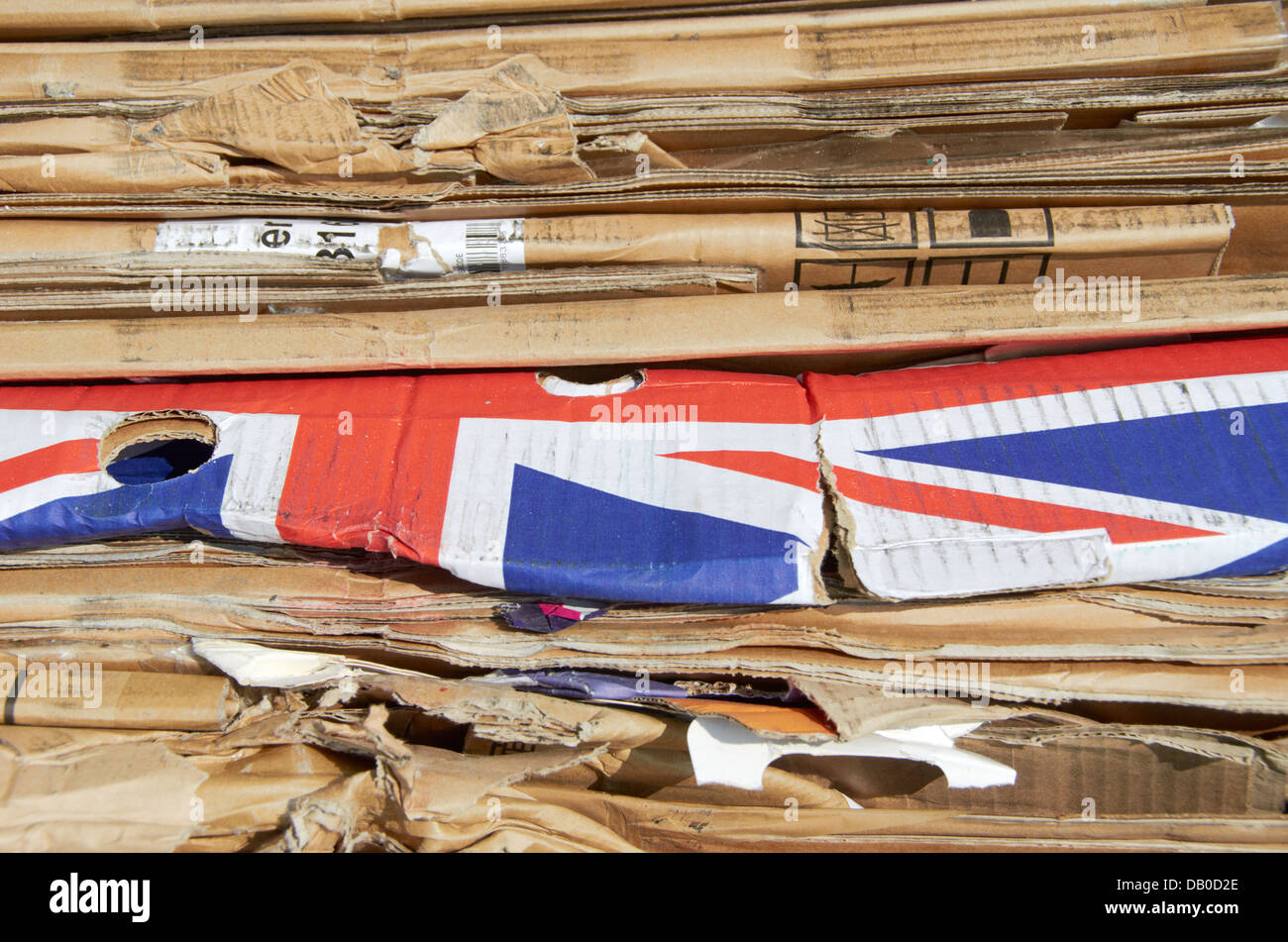 Cardboard that has been compacted in a baling machine Stock Photo - Alamy