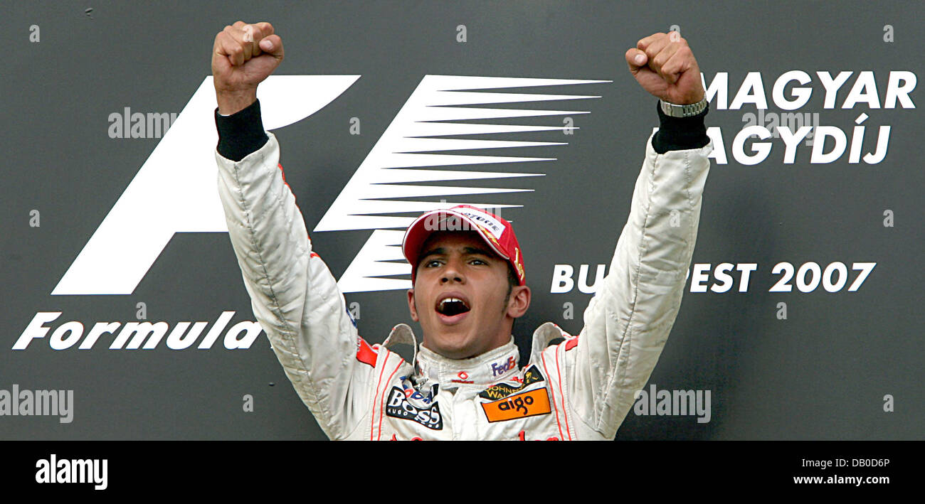 British Formula 1 driver Lewis Hamilton of McLaren Mercedes cheers on ...