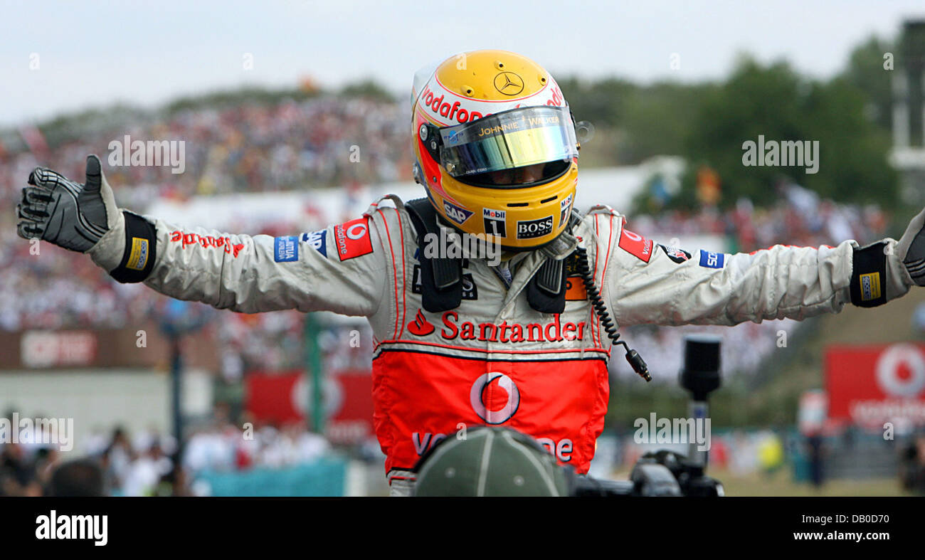 British Formula 1 driver Lewis Hamilton of McLaren Mercedes cheers ...