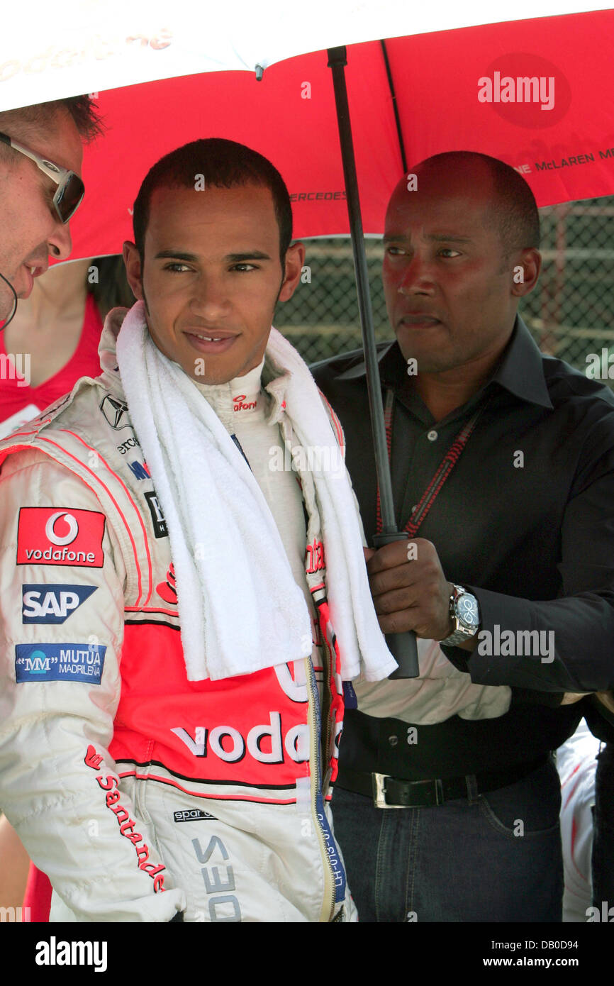 The British Formula 1 driver Lewis Hamilton (C) of McLaren Mercedes ...