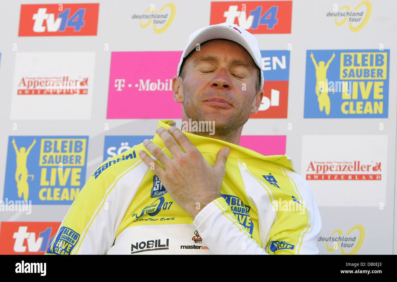 German cyclist Jens Voigt of Team CSC wears the Yellow jersey as ...
