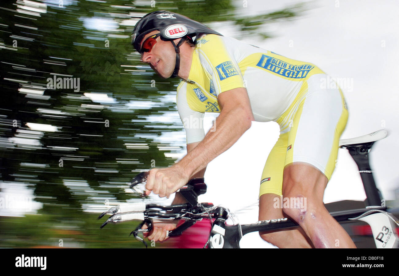 German cyclist Jens Voigt of Team CSC wearing the yellow jersey of the ...