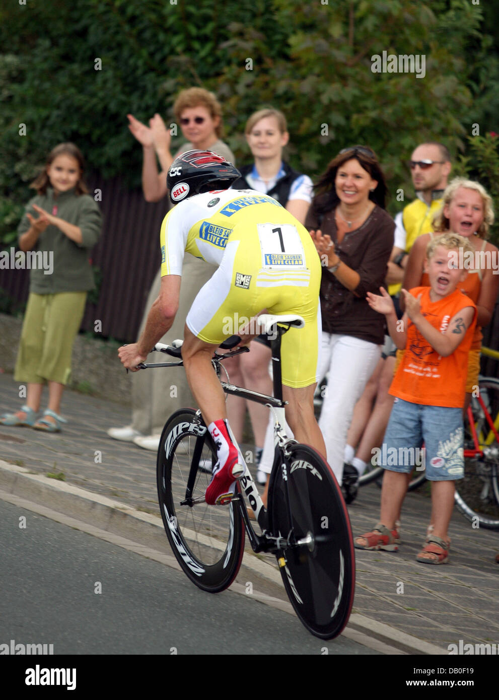 German cyclist Jens Voigt of Team CSC wearing the yellow jersey of the ...