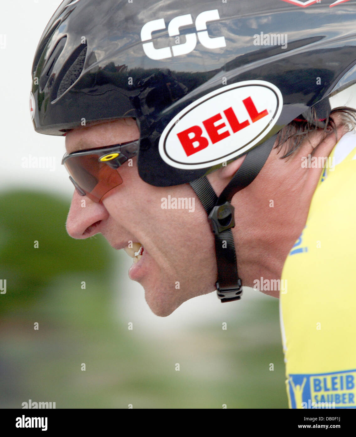 German cyclist Jens Voigt of Team CSC wearing the yellow jersey of the ...