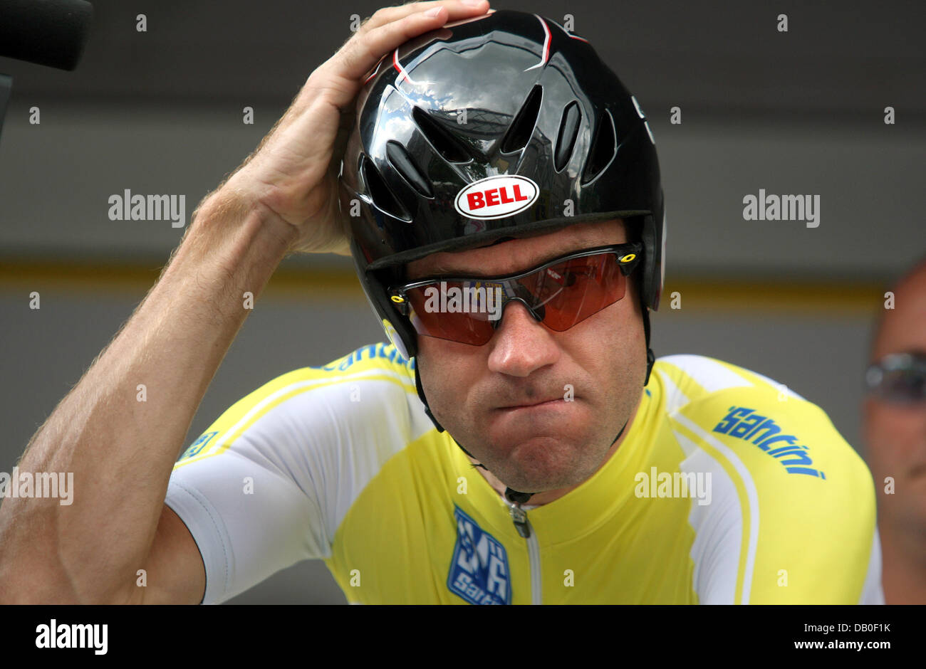German cyclist Jens Voigt of Team CSC wearing the yellow jersey of the ...