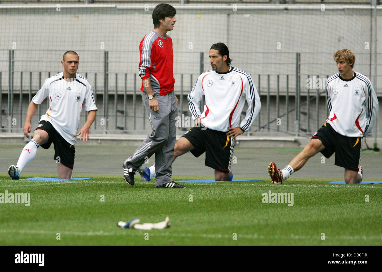 The head coach of the German national soccer team, Joachim Loew (2-L ...