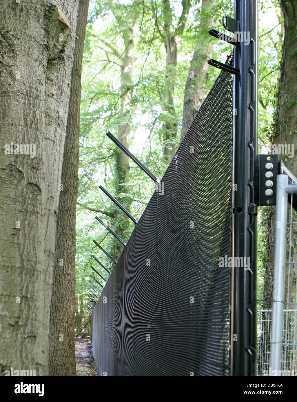 The picture shows the fence around Drakenstein castle and its park near ...